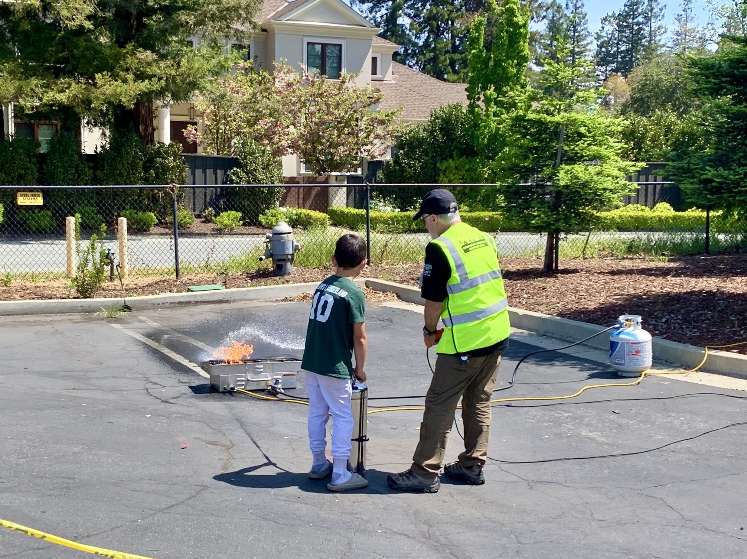 Spotted: Youngster putting out fire at Community Disaster Preparedness ...